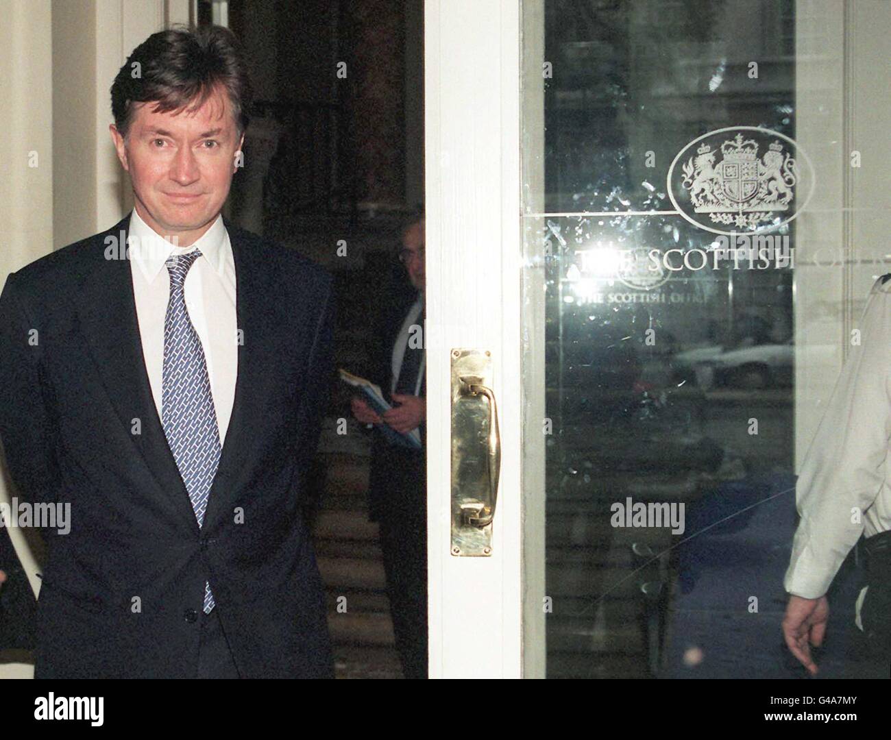 British Airways chief Bob Ayling walks through the doors of the ...