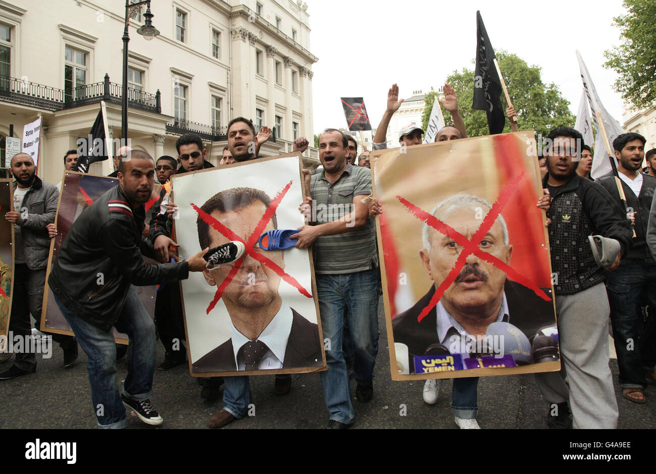 Muslims from across the UK demonstrate outside the Syrian embassy in ...