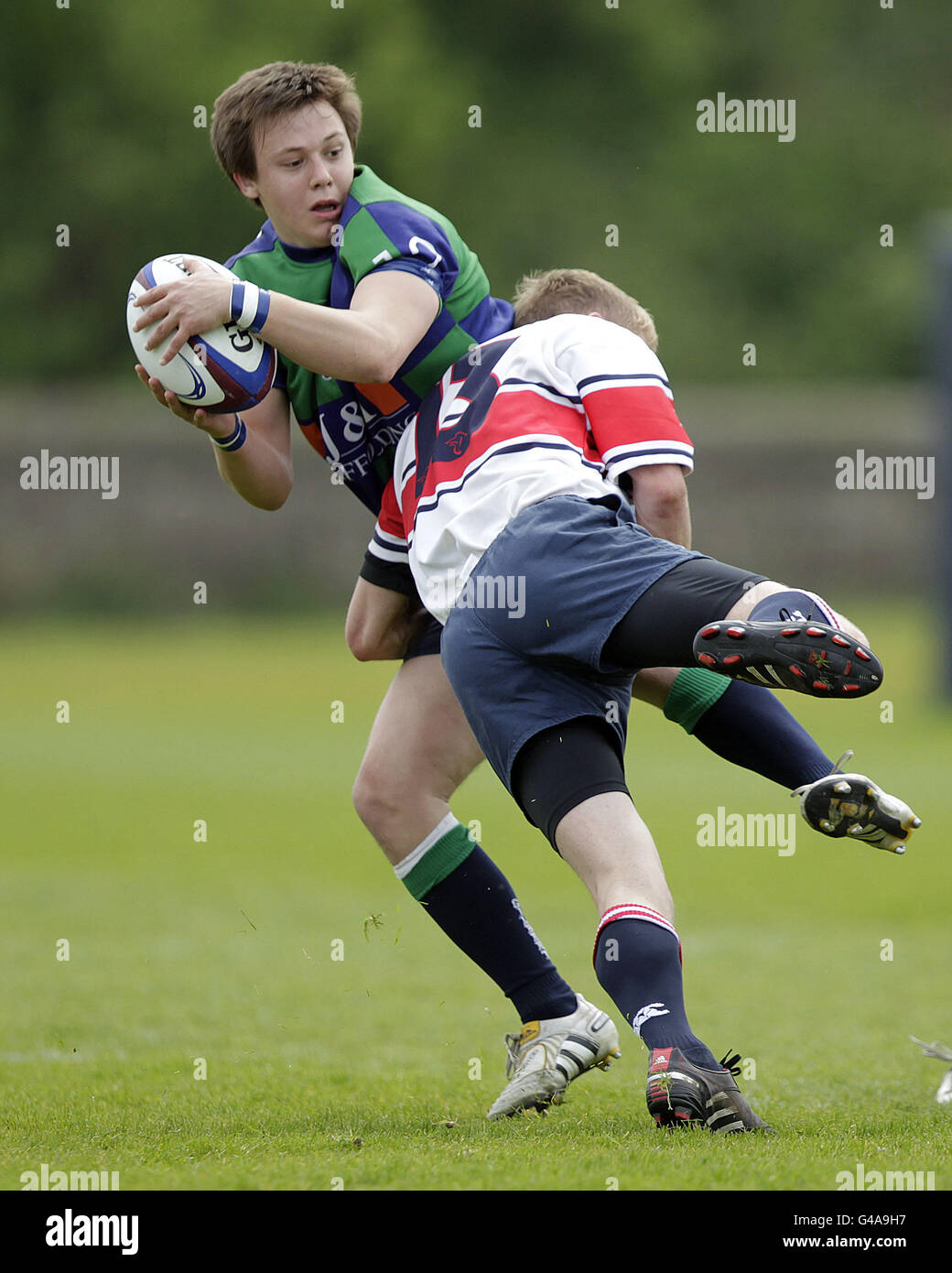 Boroughmuir's Matthew Benger tackled by Kilmarnock's John Dewar (right ...