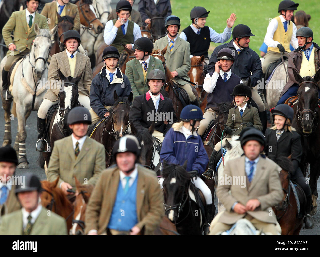Horses and their riders go through the streets of Hawick on the first ...