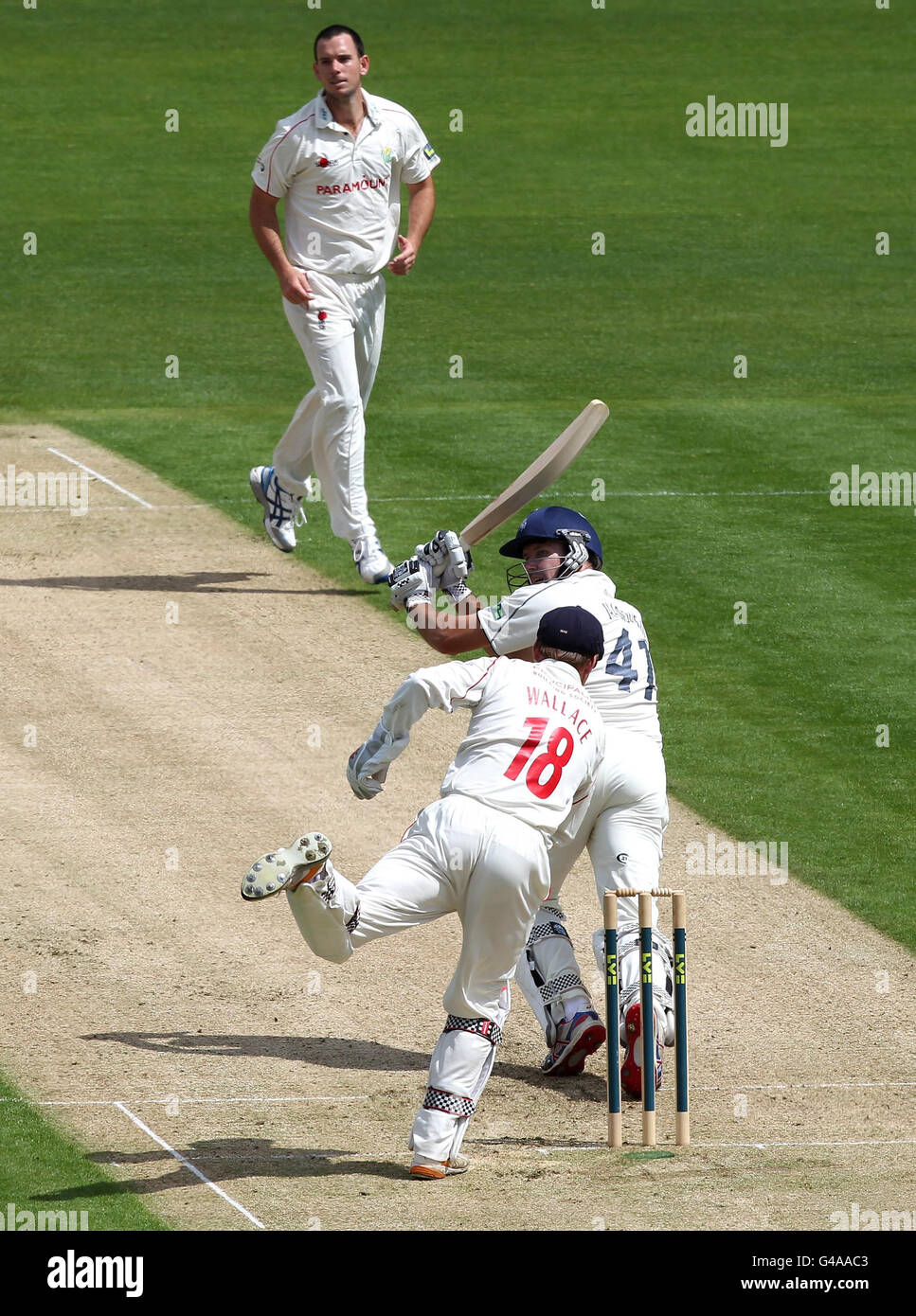 Kent's Martin van Jaarsveld flicks the ball past Glamorgan wicket ...
