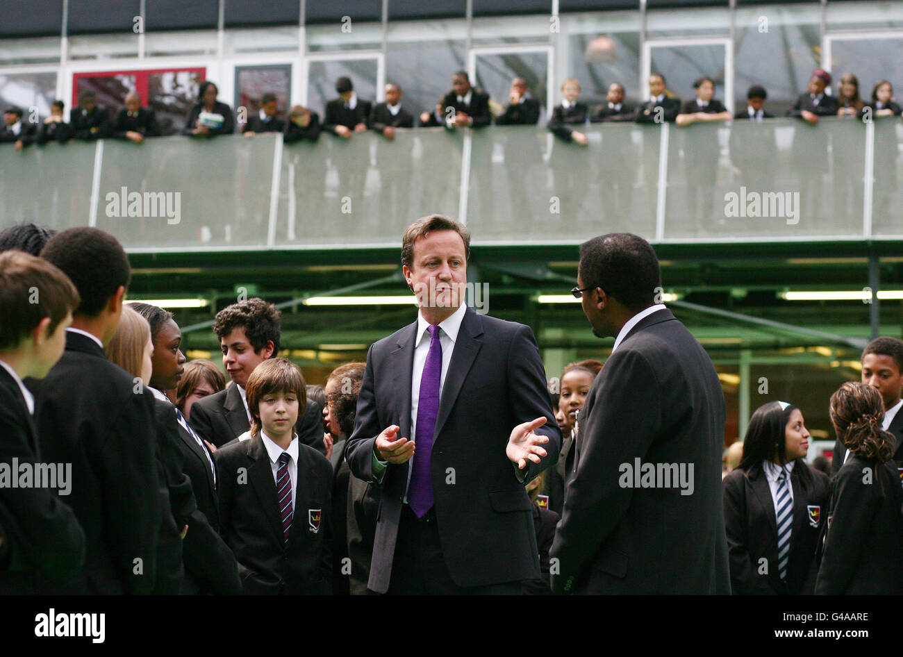 British Prime Minister David Cameron talks to Headteacher Steve ...