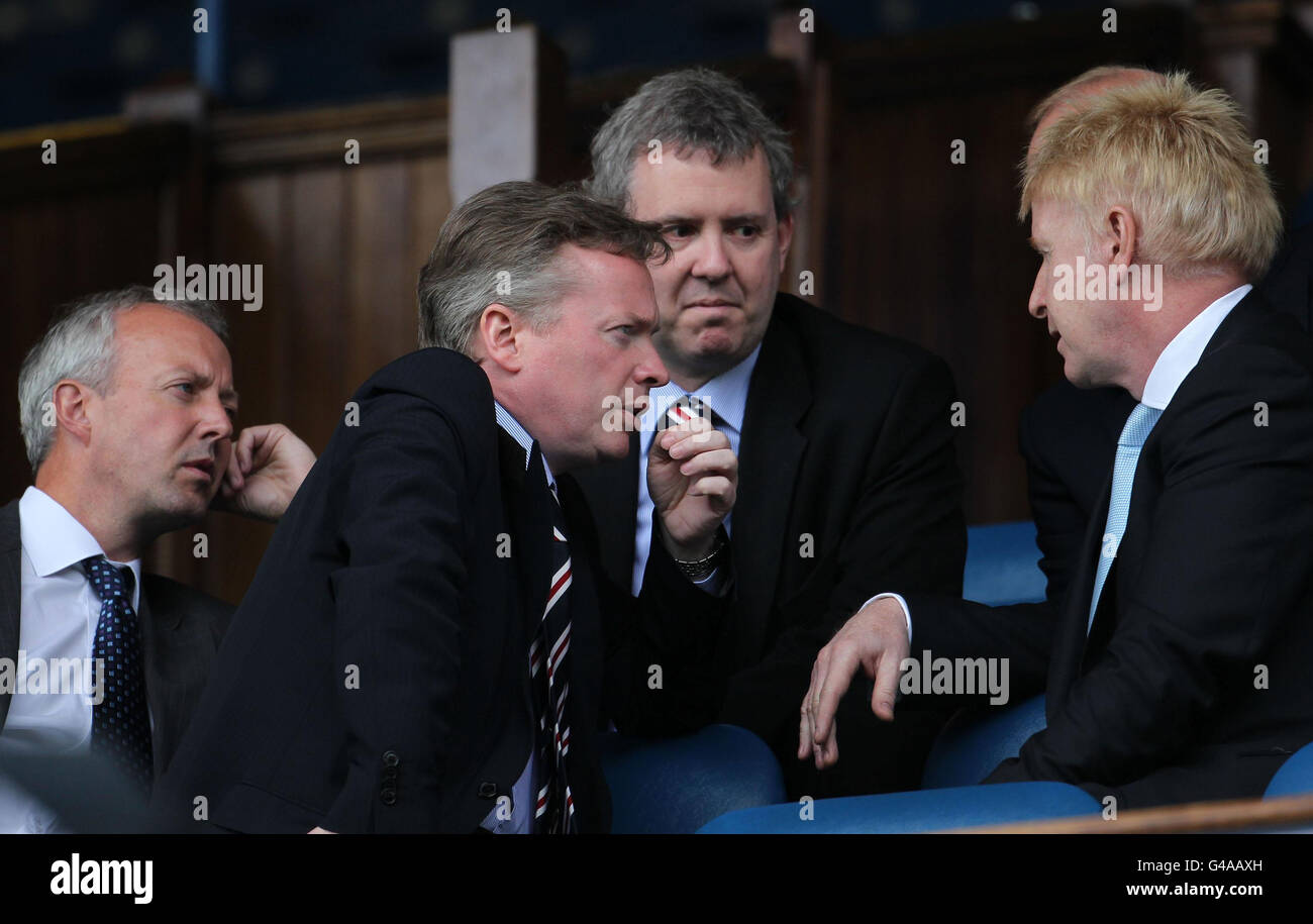 Rangers' new owner Craig Whyte talks to Donald Muir in the Directors ...