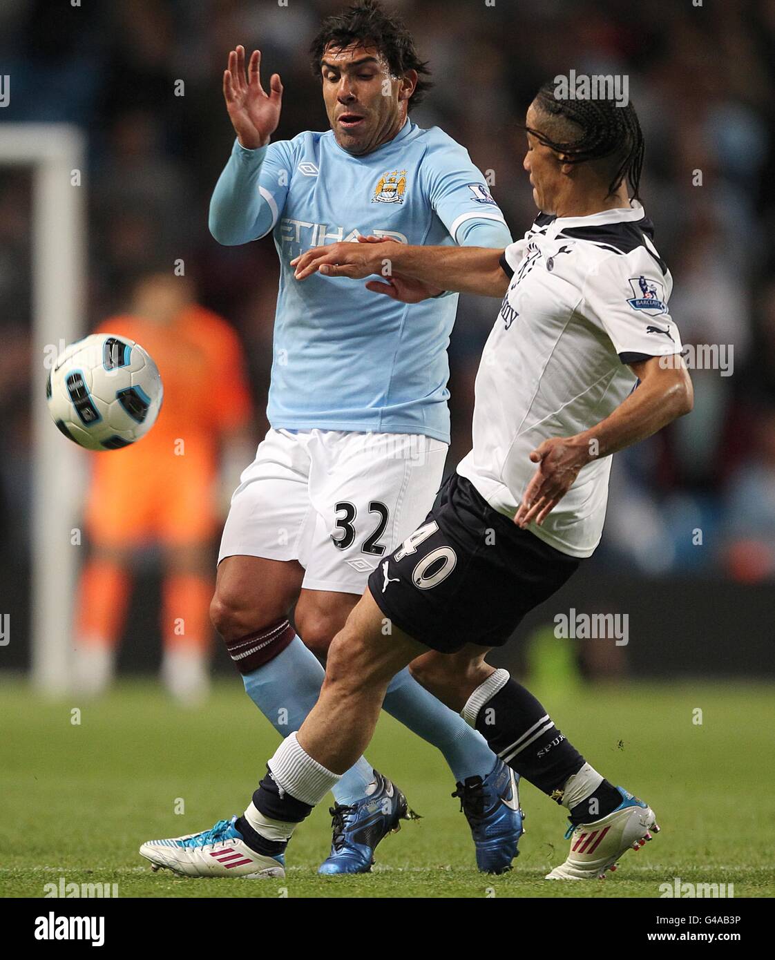 Tottenham Hotspur's Steven Pienaar (right) and Manchester City's Carlos ...