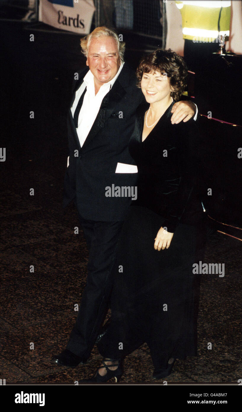 FILM DIRECTOR MICHAEL WINNER AND HIS GIRLFRIEND VANESSA PERRY ARRIVE AT ...
