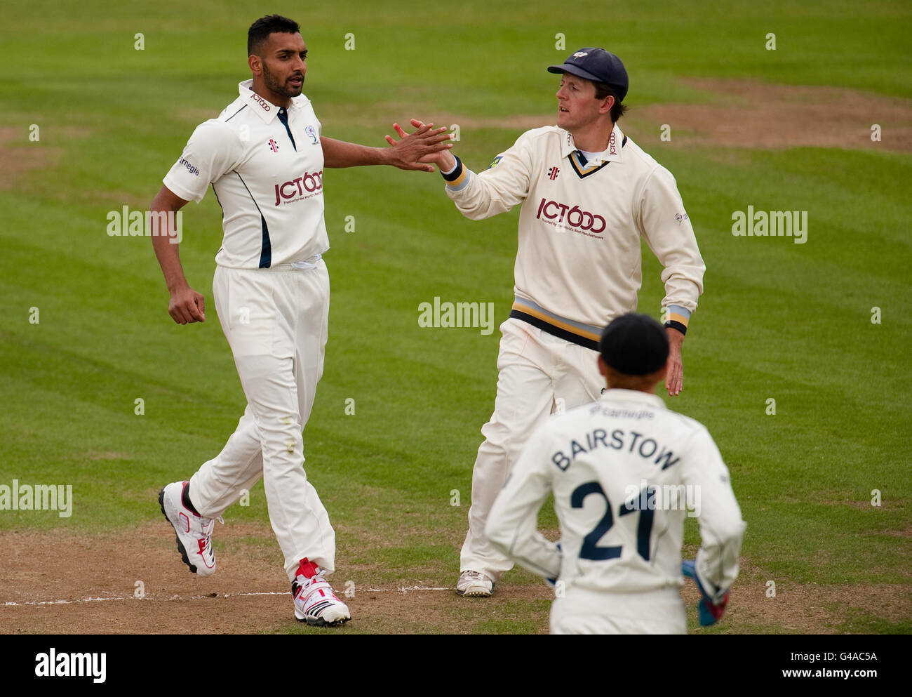 Cricket yorkshire full length celebrating mangss hi-res stock ...