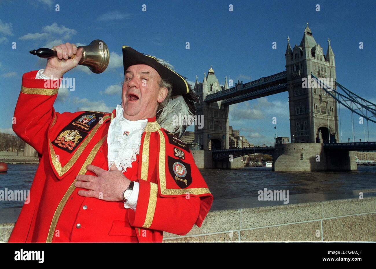 London Town Crier in front of Tower Bridge Stock Photo - Alamy