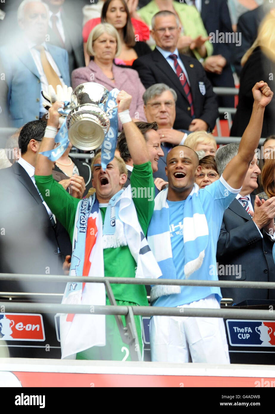 Manchester City's players lift the FA Cup trophy during the FA Cup ...