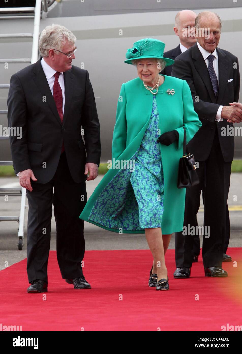 Britain's Queen Elizabeth II and the Duke of Edinburgh are greeted by ...