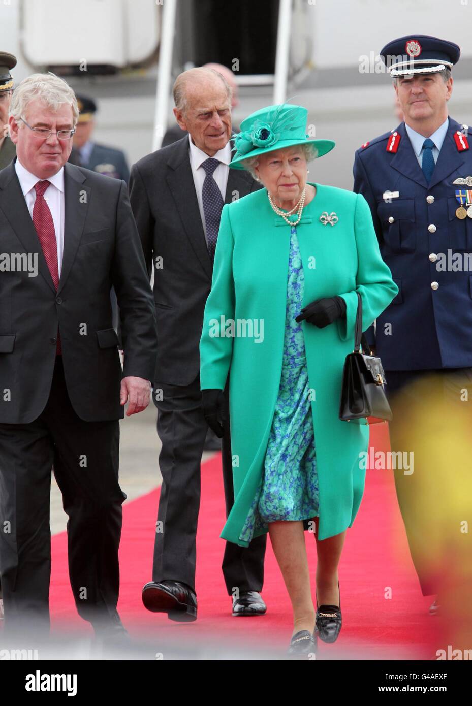 Britain's Queen Elizabeth II and the Duke of Edinburgh are greeted by ...