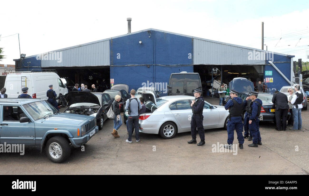 Police officers raid bray engineering in southall hi-res stock ...