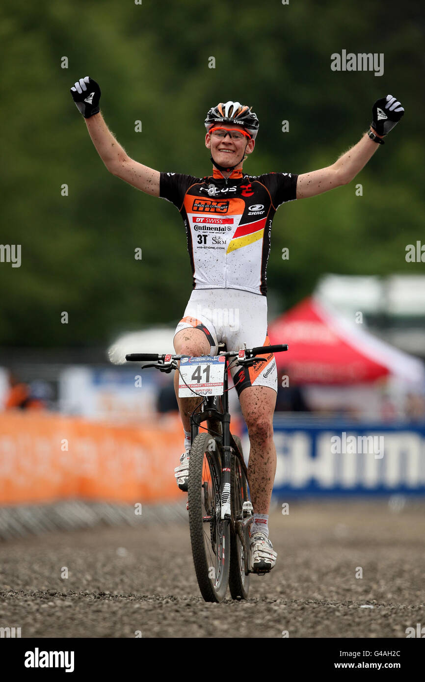 Germany's Markus Schulte-Luenzum celebrates finishing third in the Mens ...