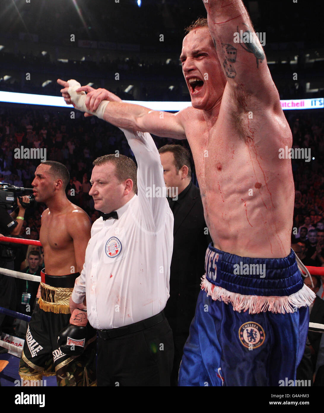 George Groves celebrates his victory over James DeGale in the British ...