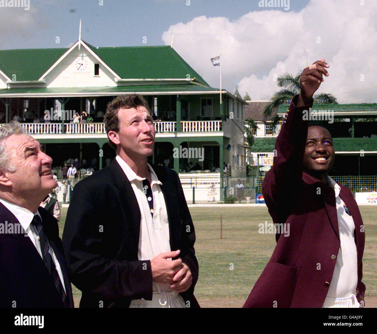 IOC Referee Barry Jarman (left) and England captain Michael Atherton ...