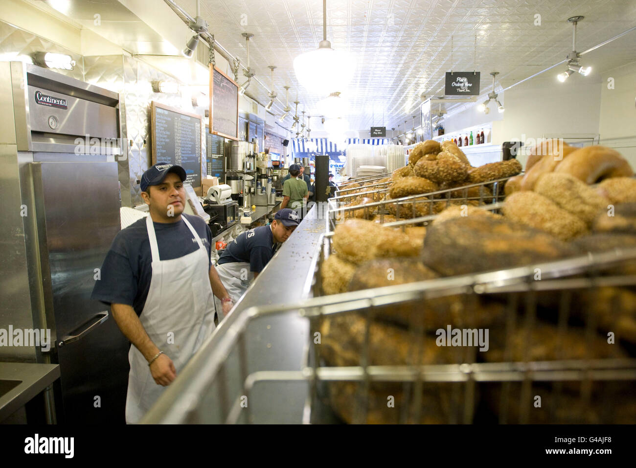 Inside the famous Murray's Bagels bagel store on 8th Avenue in New York ...