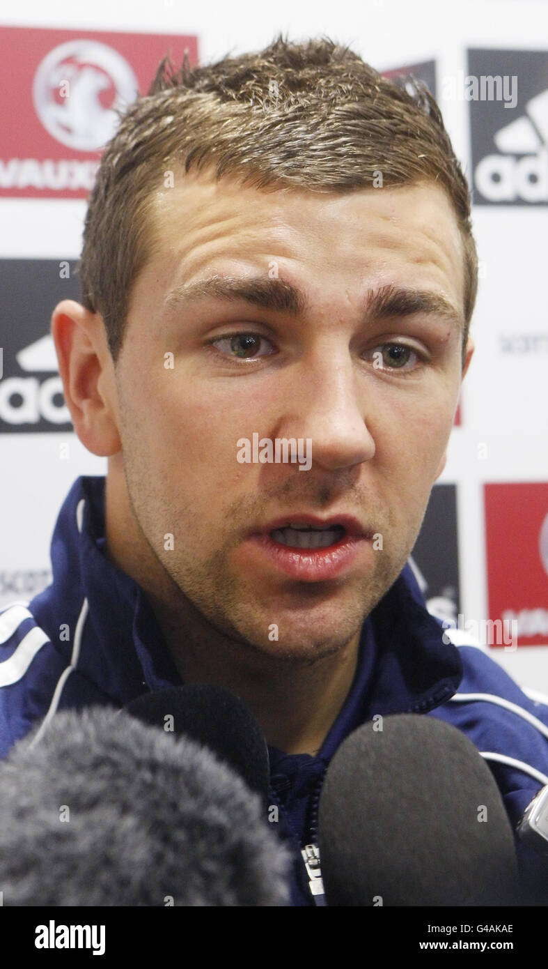 Scotland's James McArthur chats to the press as he arrives at Glasgow ...