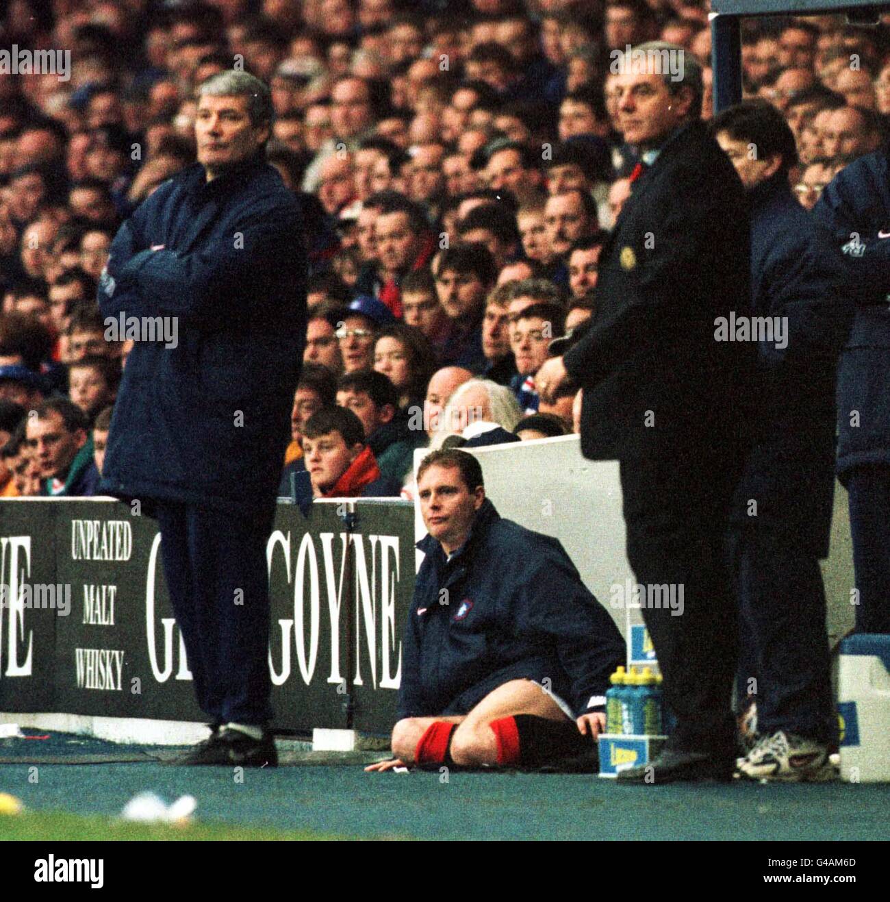 Rangers' Paul Gascoigne watches from the bench as Rangers beat Aberdeen ...