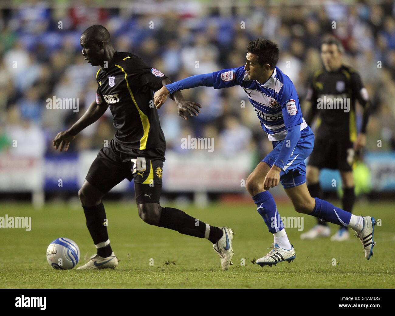 Cardiff City's Seyi George Olofinjana (left) and Reading's Jem Karacan ...