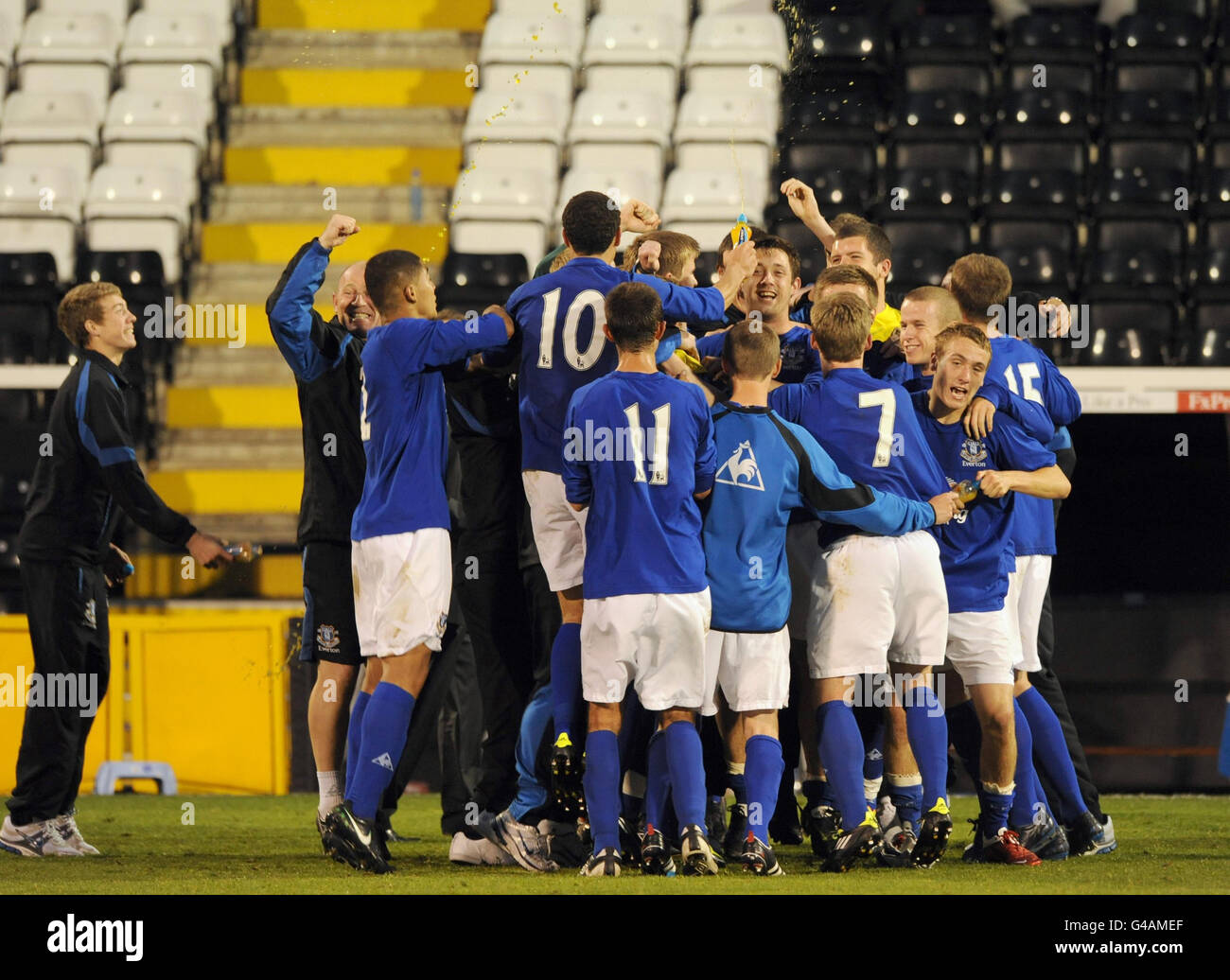 Everton players celebrate following the final whistle during the Under ...