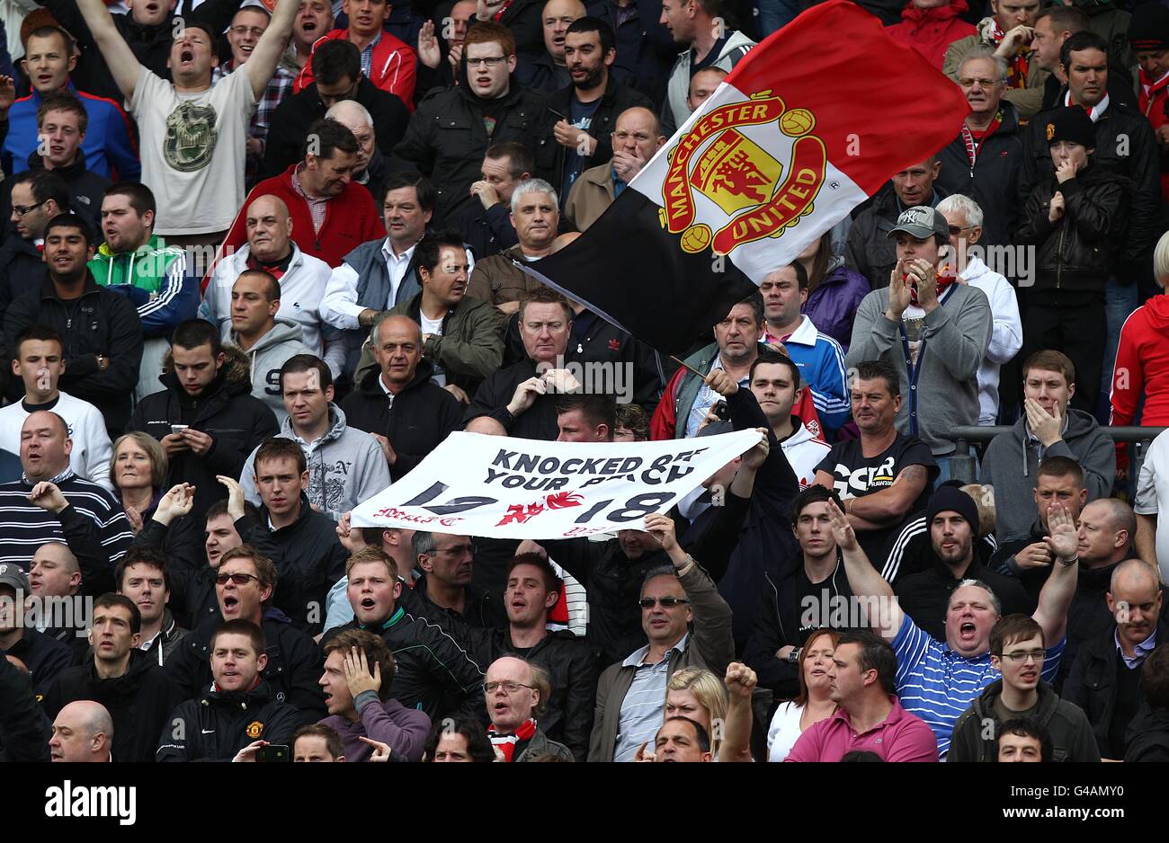 Manchester United fans show their support in the stands before kick off ...