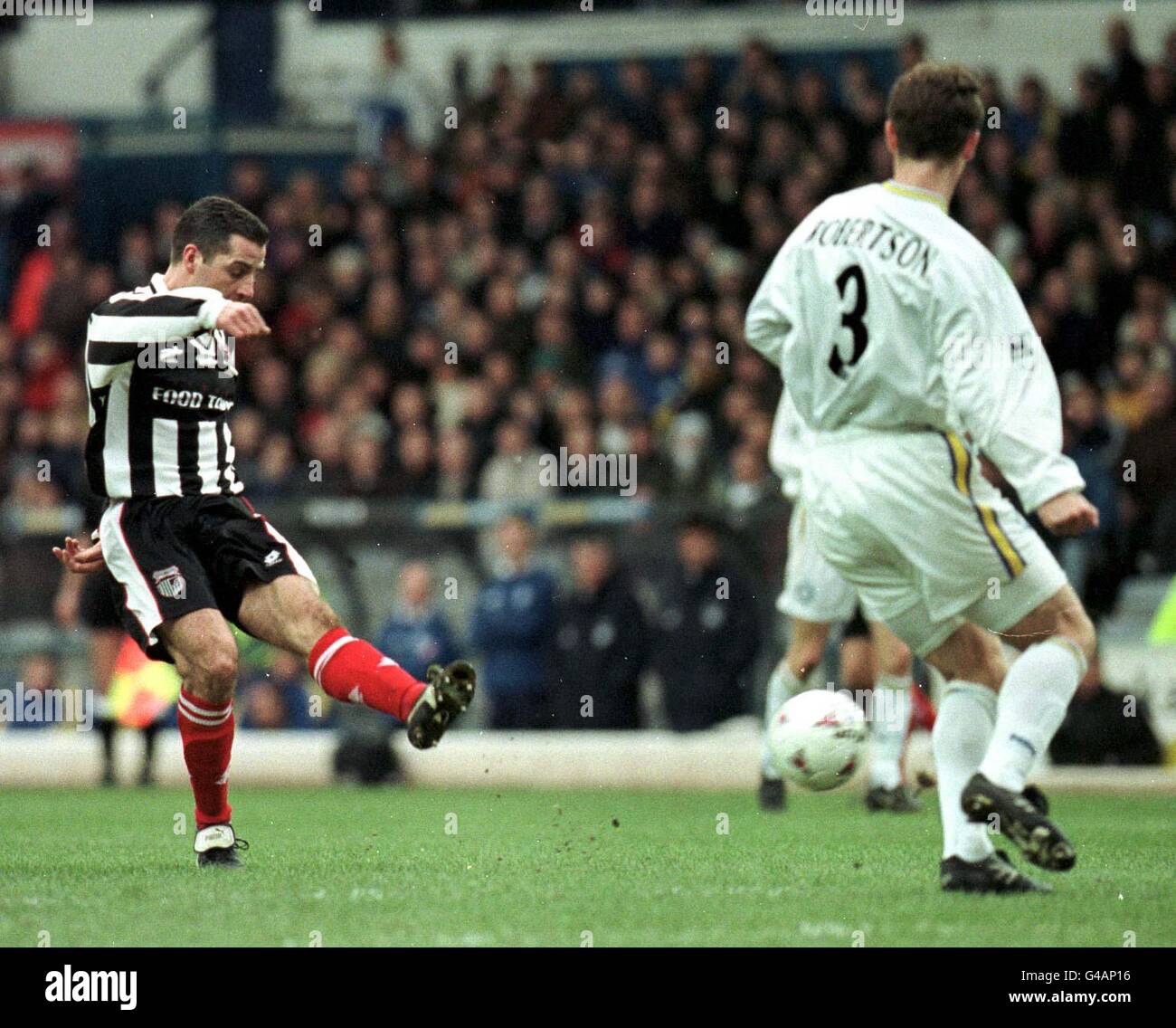 Grimsby's Kevin Jobling shoots past the Leeds defence during their FA ...