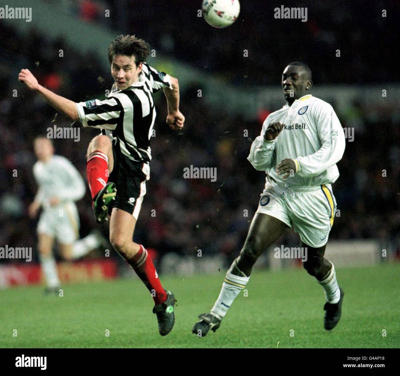 Grimsby's Peter Handyside makes a spectacular clearance in front of ...