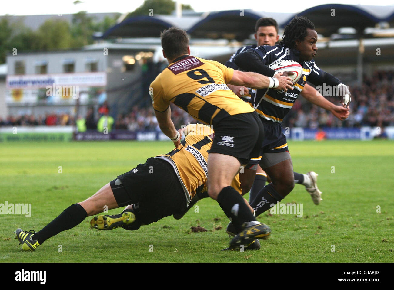 Worcester's Marcel Garvey breaks through the Cornish Pirates tackles of ...