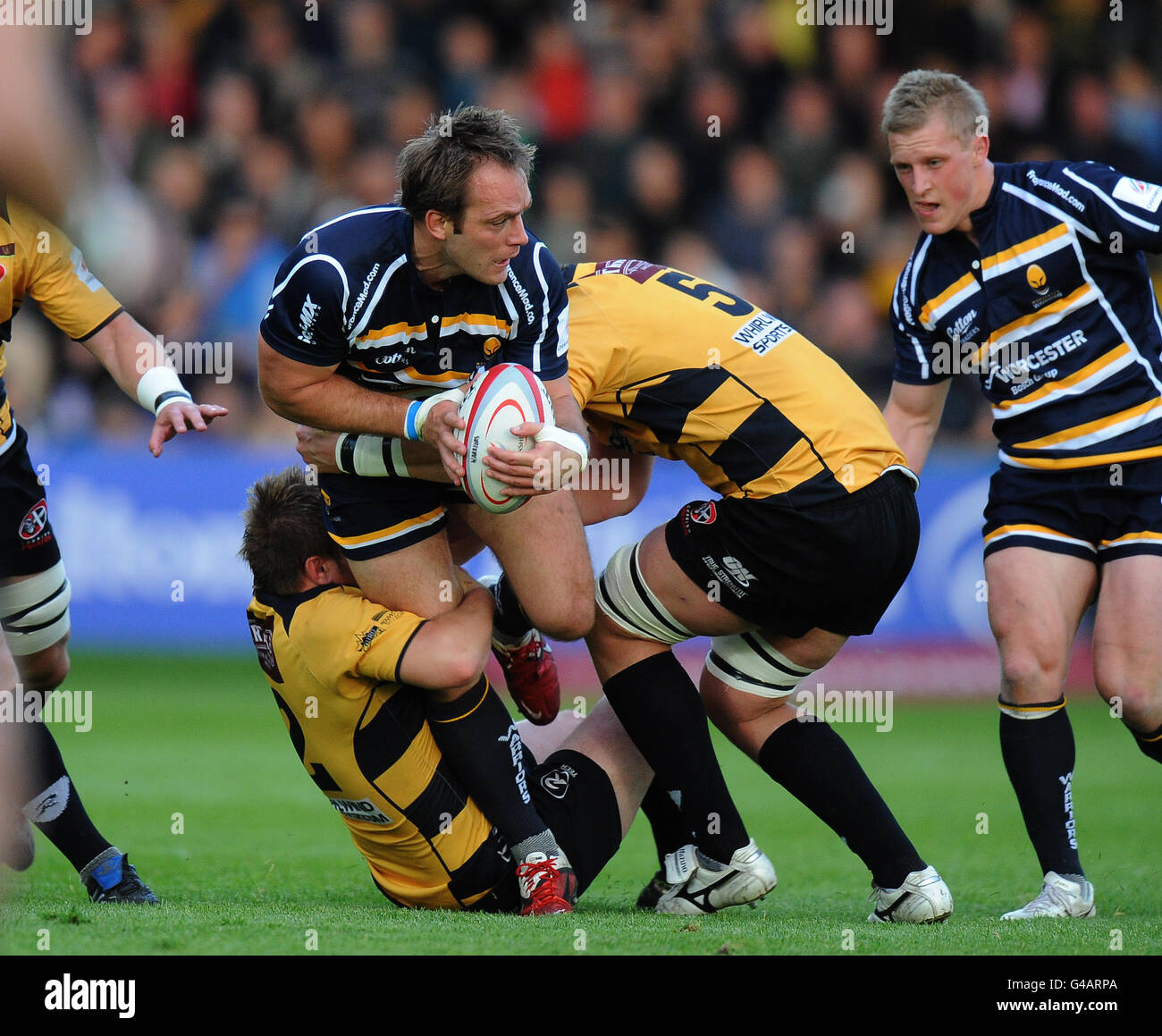 Worcester Warriors' Kai Horstmann tackled by Cornish Pirates' Rob ...