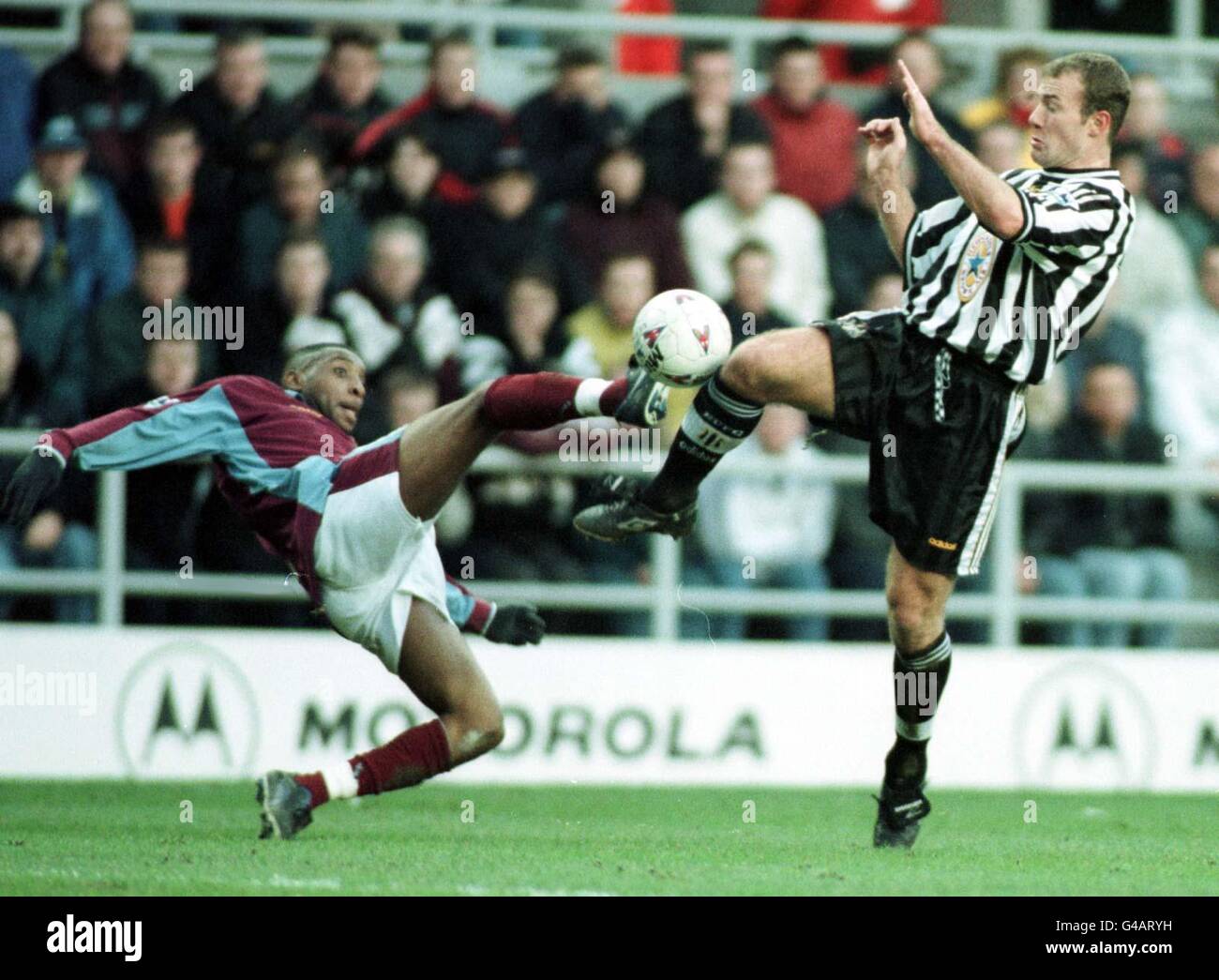 Newcastle's Alan Shearer (right) battles with West Ham's Andrew Impey ...