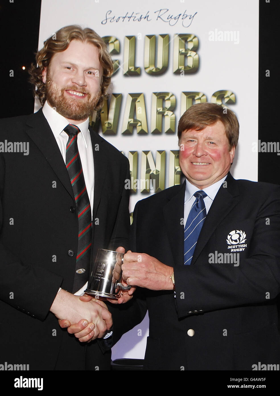 John Davidson (right) presents a Premier League One POTS Award to Rory ...