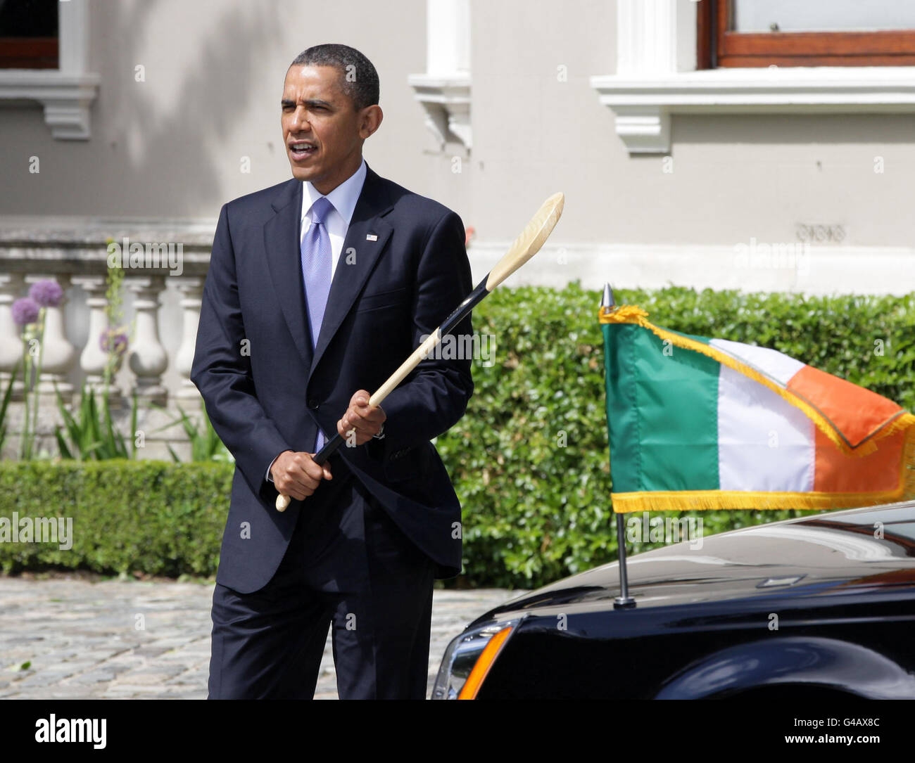 US President Barack Obama holds a hurley presented to him by Taoiseach ...