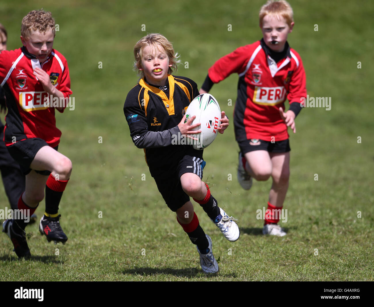 Kids enjoy playing rugby during the Forrester Mini Tournament at ...