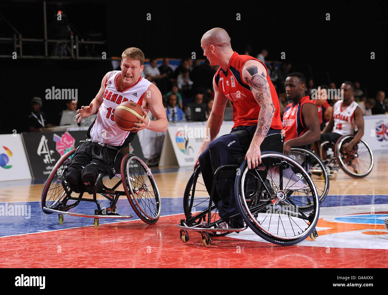 Canada's Patrick Anderson (left) takes on Great Britain's Terrance ...
