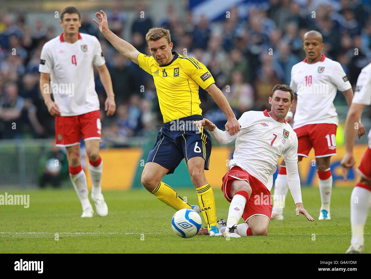 Scotland's James Morrison and Wales's Andrew Dorman (right) battle for ...