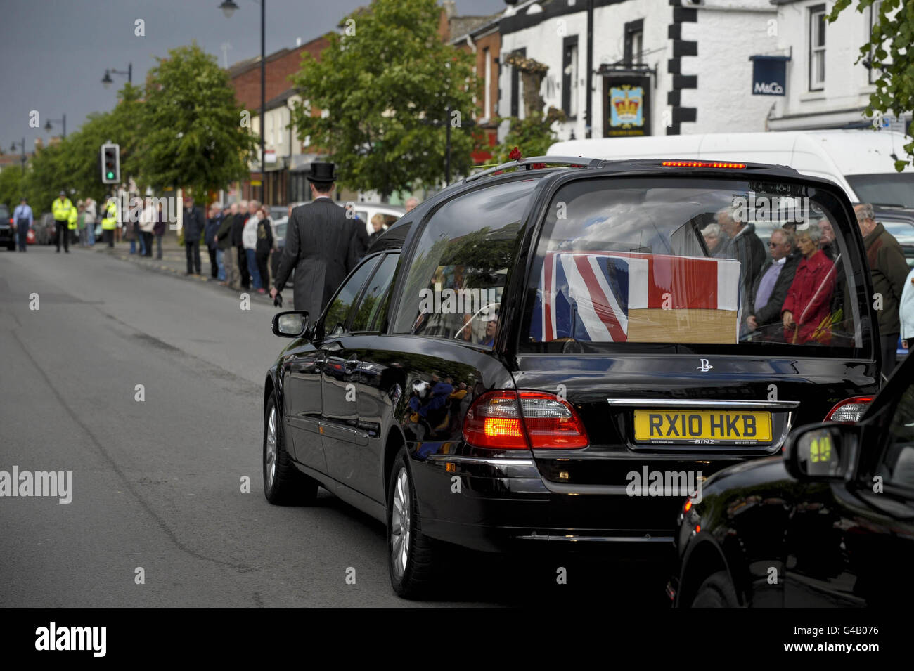 A hearse carrying the coffin of Colour Serjeant Kevin Fortuna, of A ...