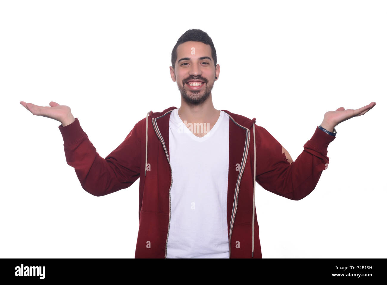 Potrait of young latin man offering something. Isolated white ...
