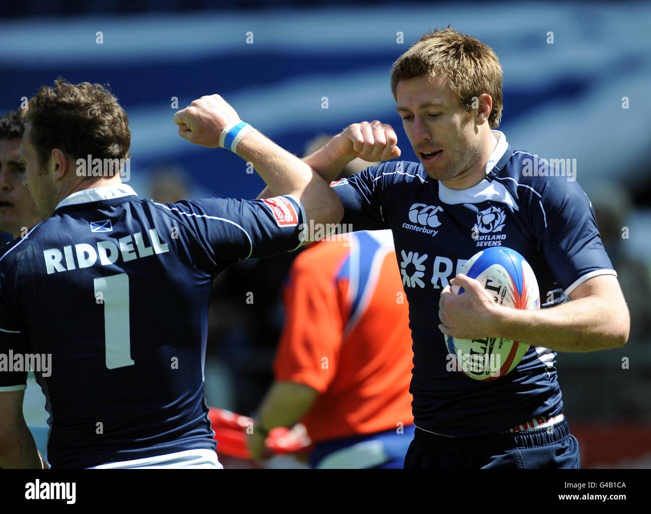 Scotland's Jim Thompson is congratulated by Scott Riddell after scoring ...