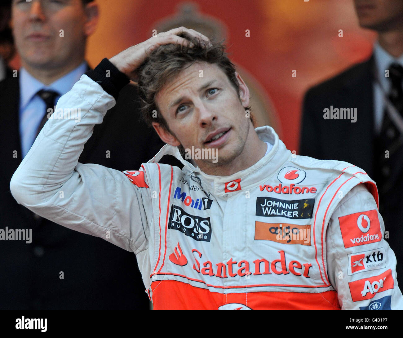 Great Britain's Jenson Button reflects on his third place finish during ...