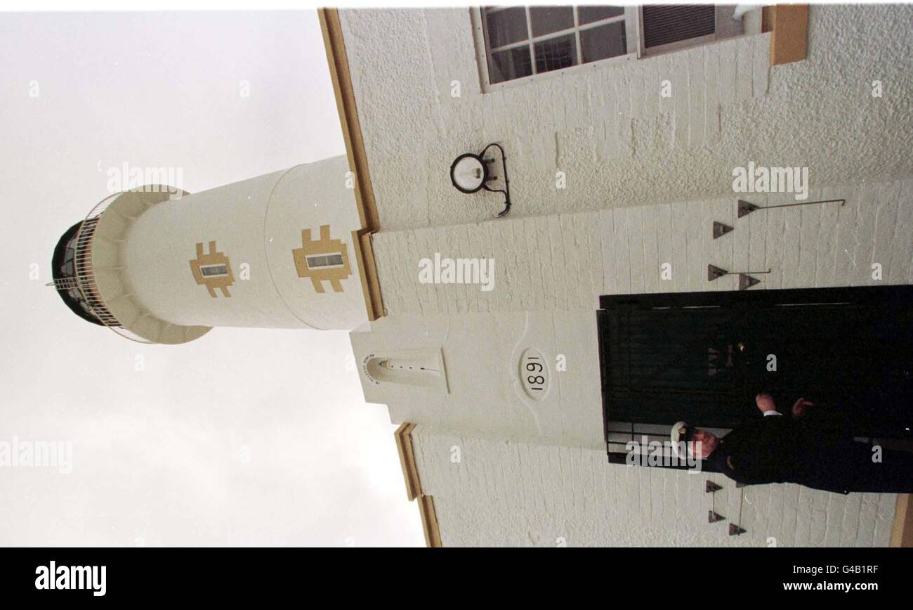Angus Hutchison, Principal Lightkeeper locks the door of his lighthouse ...