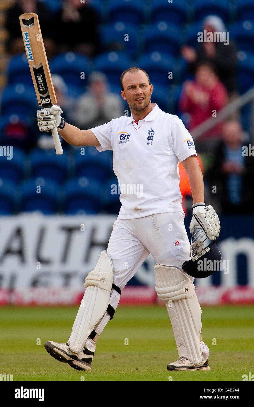 England's Jonathan Trott salutes the crowd upon reaching his double ...