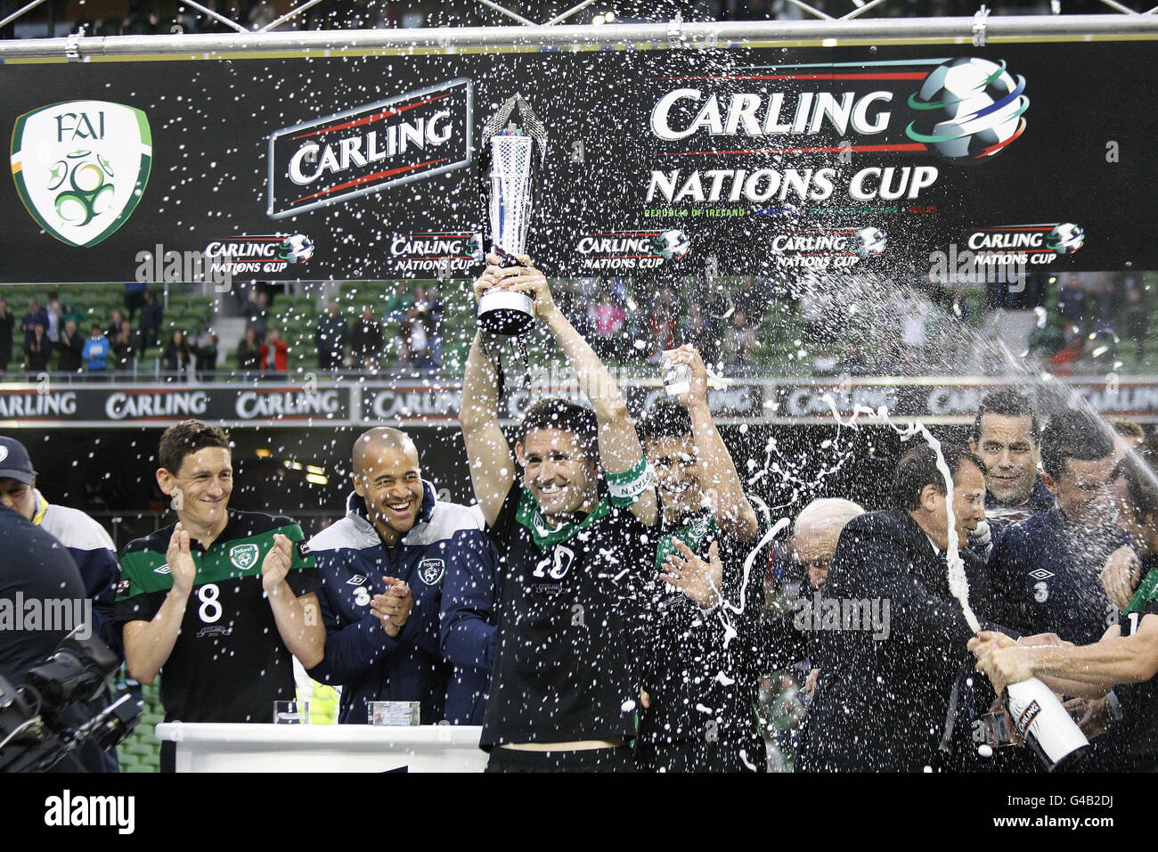 Republic of Ireland's Robbie Keane lifts the trophy after they won ...