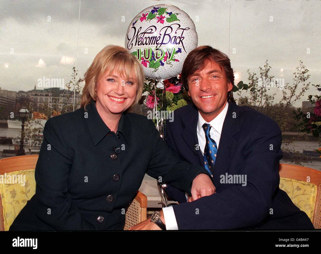 TV presenter Judy Finnigan poses for the media with her husband Richard ...