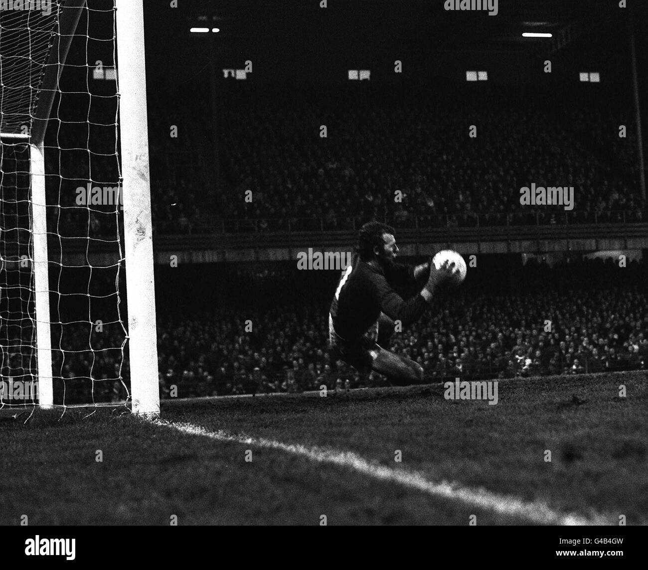Arsenal goalkeeper bob wilson in action Black and White Stock Photos ...