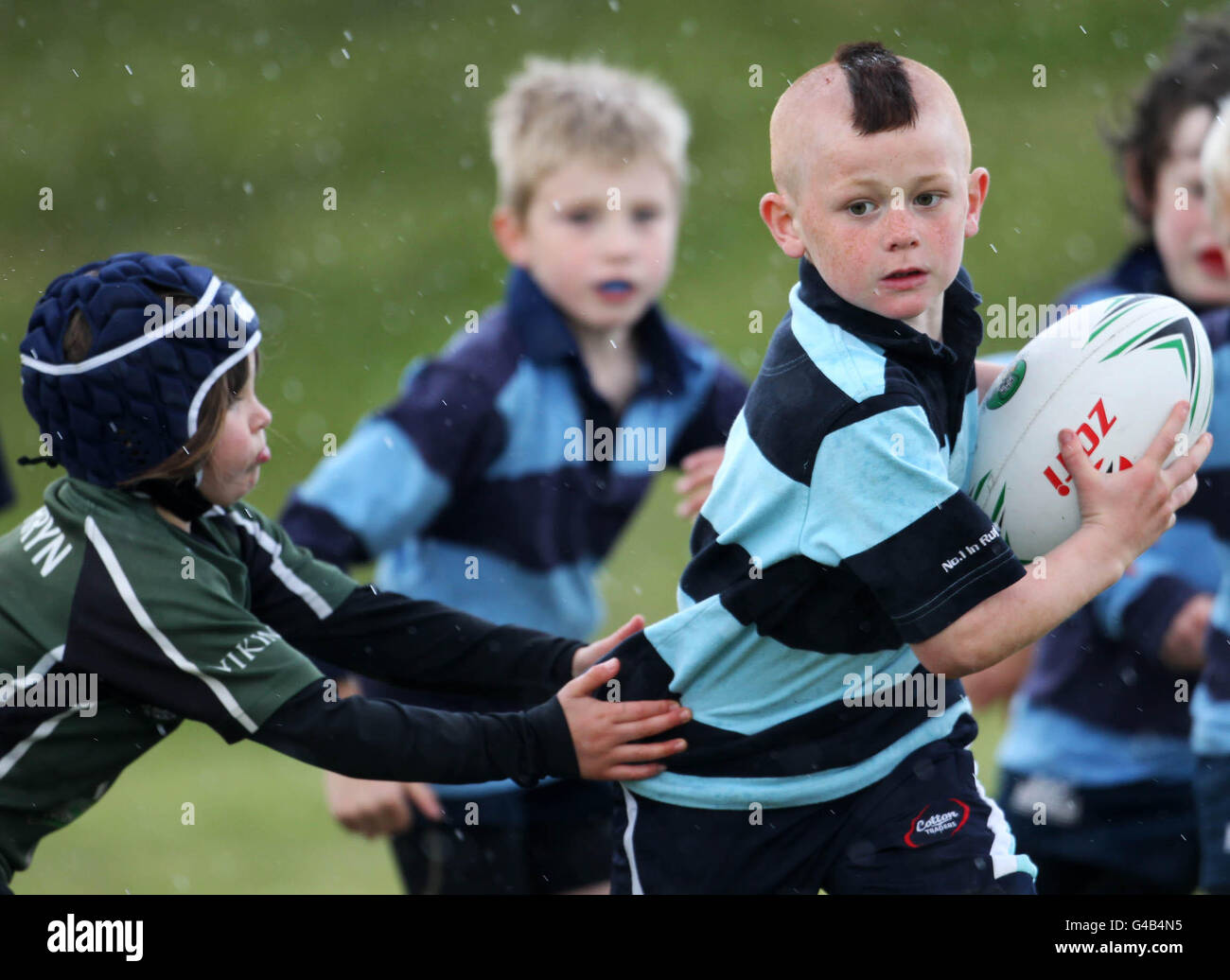 Kids enjoy playing rugby during the Forrester Mini Tournament at ...