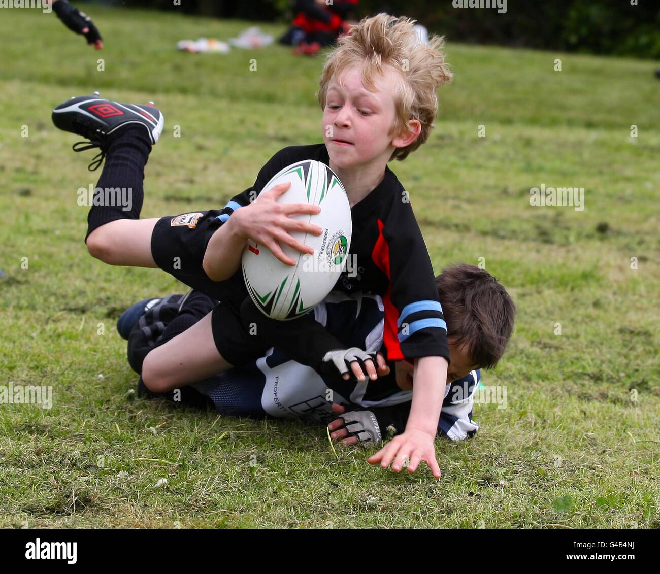 Kids enjoy playing rugby during the Forrester Mini Tournament at ...