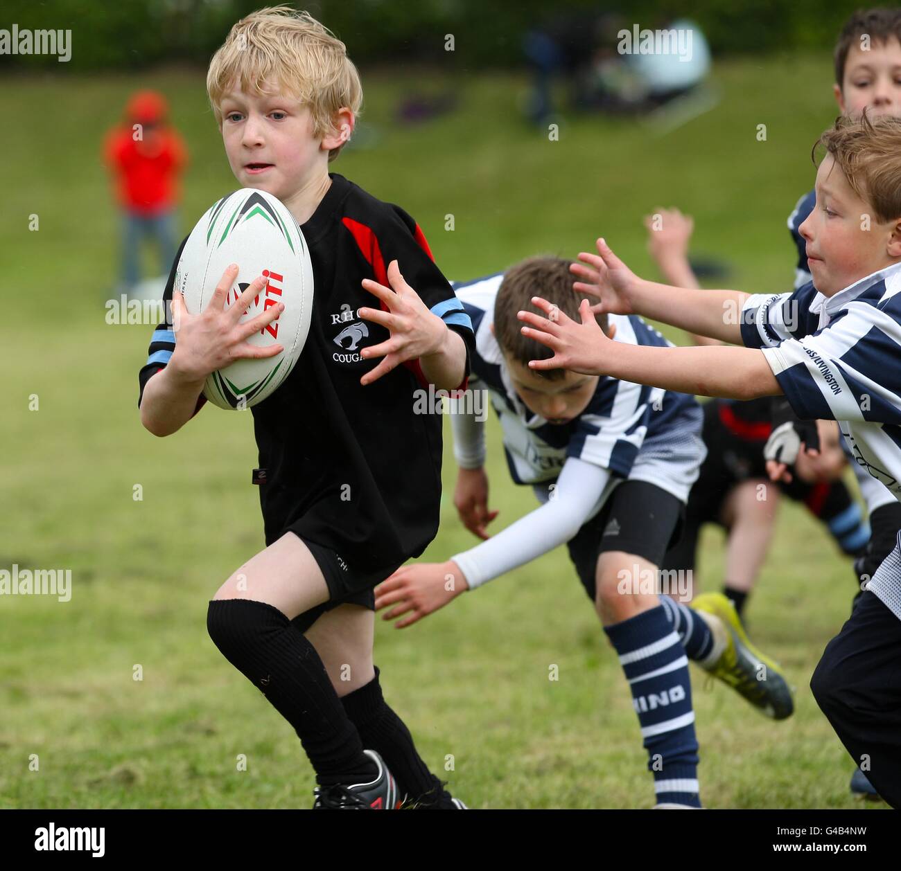 Kids enjoy playing rugby during the Forrester Mini Tournament at ...