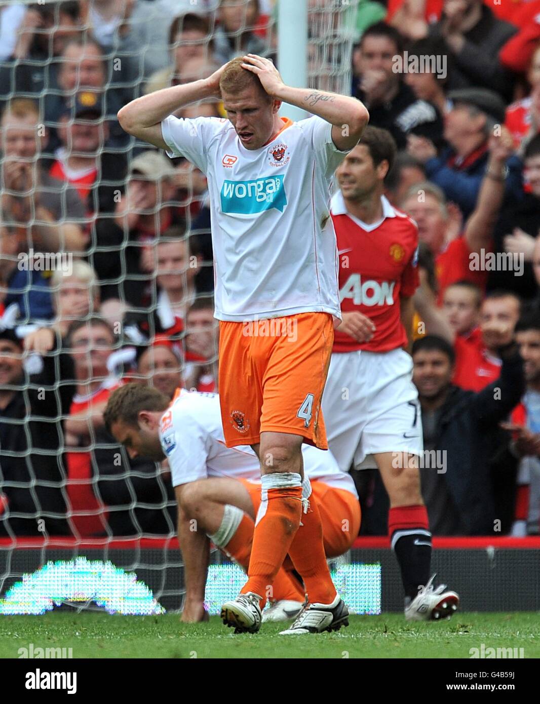 Blackpool's Keith Southern looks dejected after team mate Ian Evatt ...