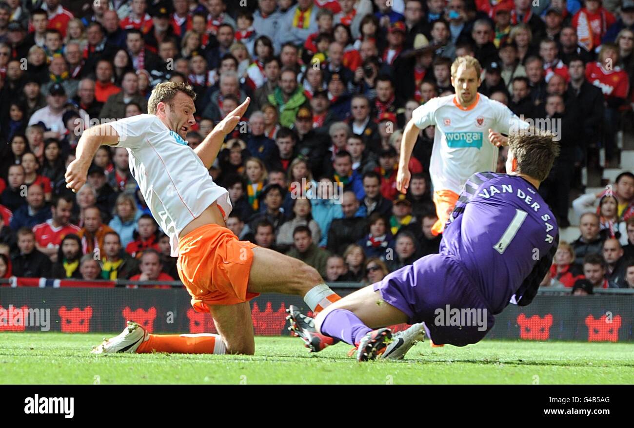 Manchester United goalkeeper Edwin Van der Sar (right) makes a save ...