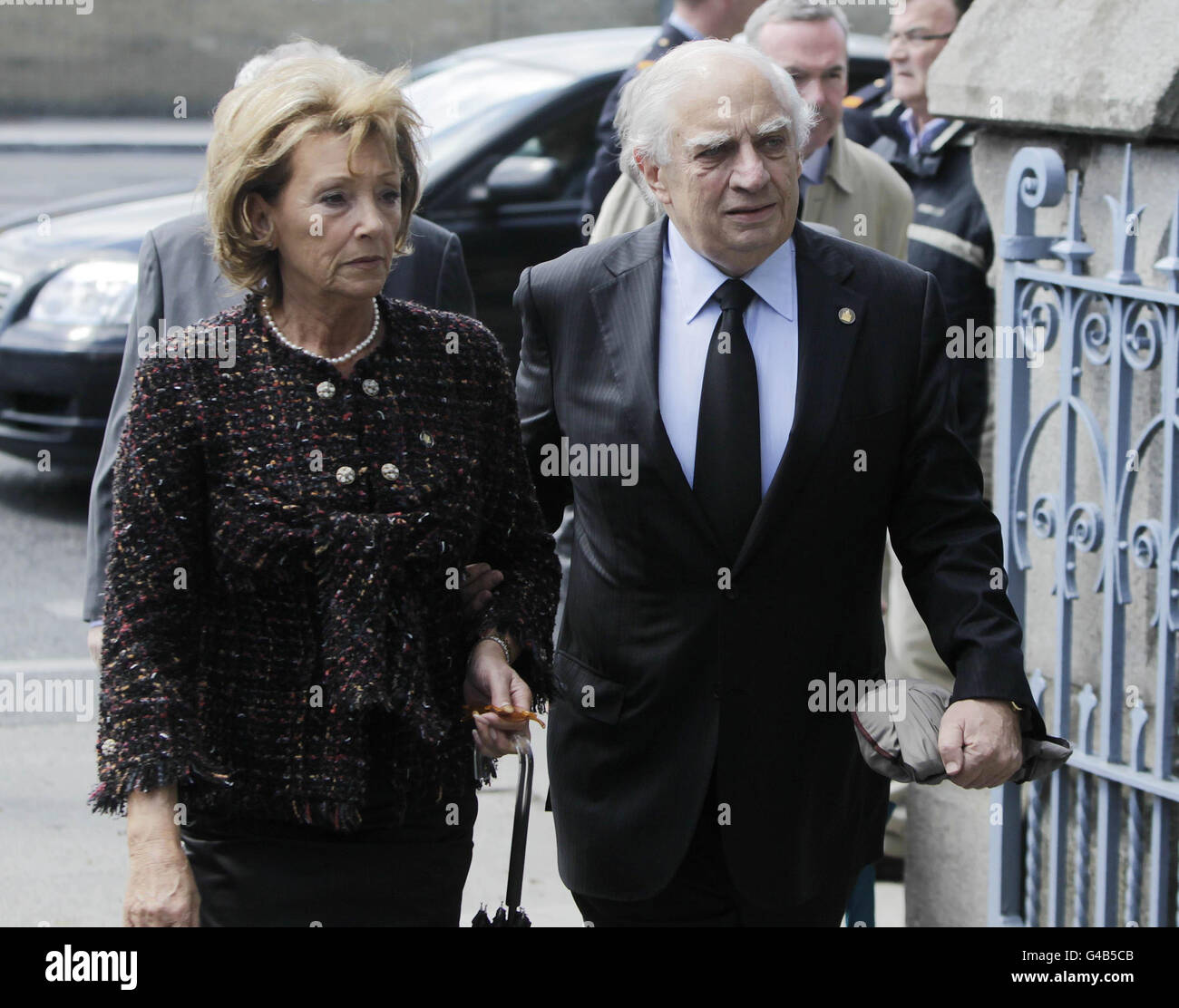 Former Attorney General Peter Sutherland arrives, with an unidentified ...