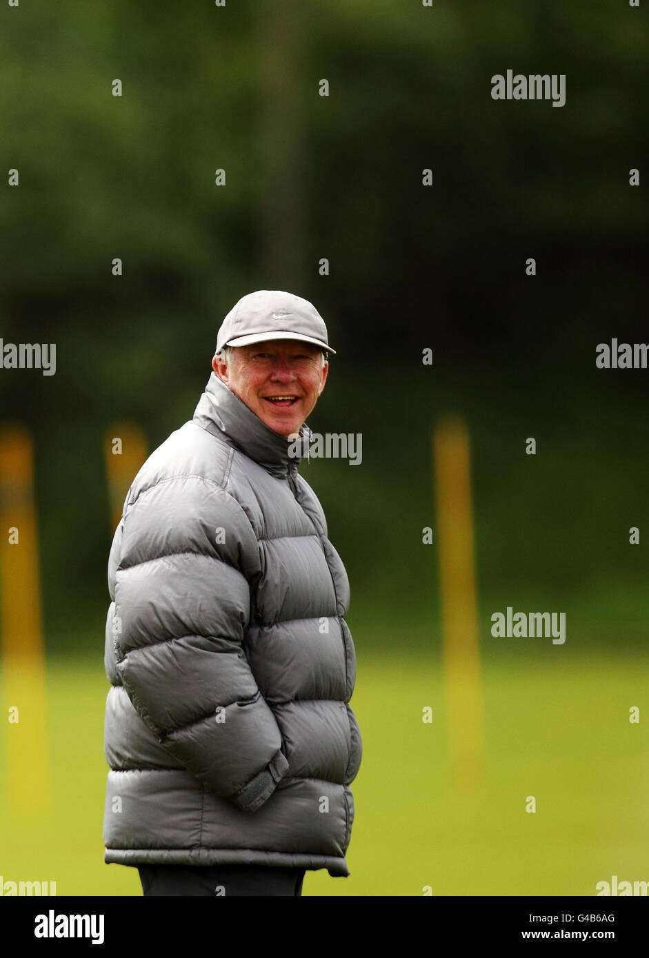Manchester United's manager Sir Alex Ferguson smiles during the ...